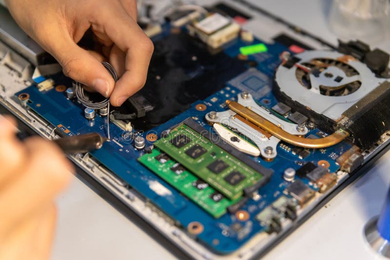 Computer Repair Technician Repairing a Laptop Stock Image - Image of ...