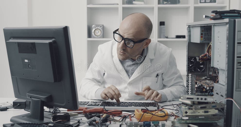 Computer Repair Technician Working on a PC Stock Image - Image of ...