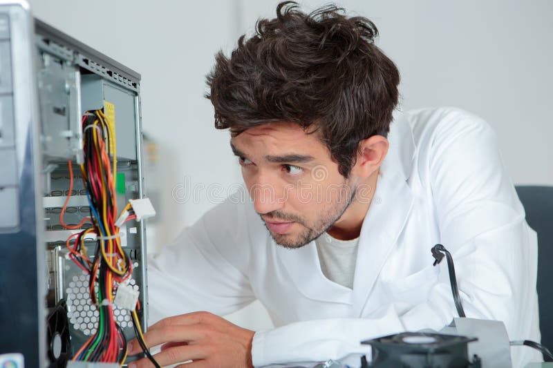 Computer Repairman Looking Confused Stock Photo - Image of tool ...
