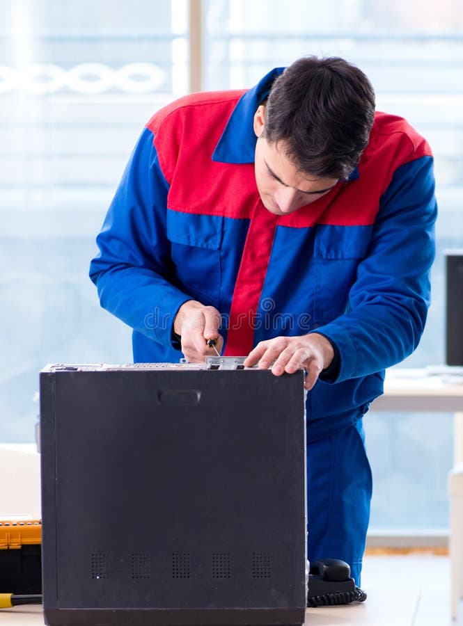 The Computer Repairman Specialist Repairing Computer Desktop Stock ...