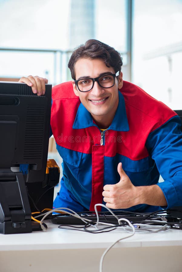 The Computer Repairman Working on Repairing Computer in it Workshop ...