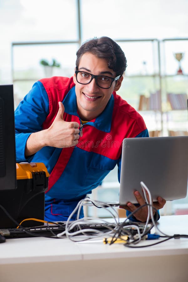 The Computer Repairman Working on Repairing Computer in it Workshop ...