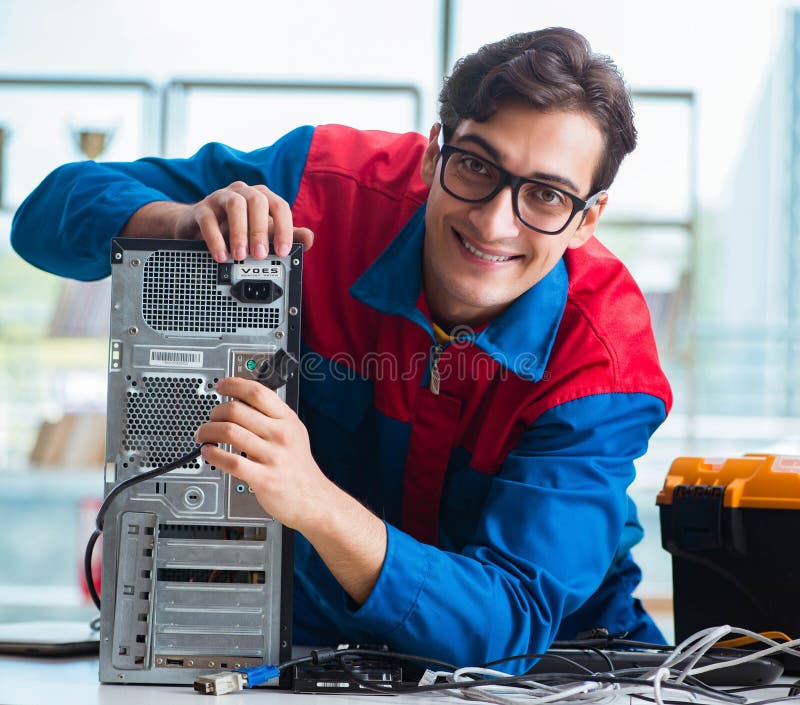 Computer Repairman Working on Repairing Computer in it Workshop Stock ...
