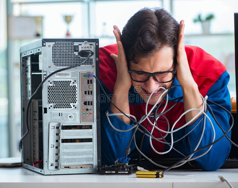 Computer Repairman Working on Repairing Computer in it Workshop Stock ...