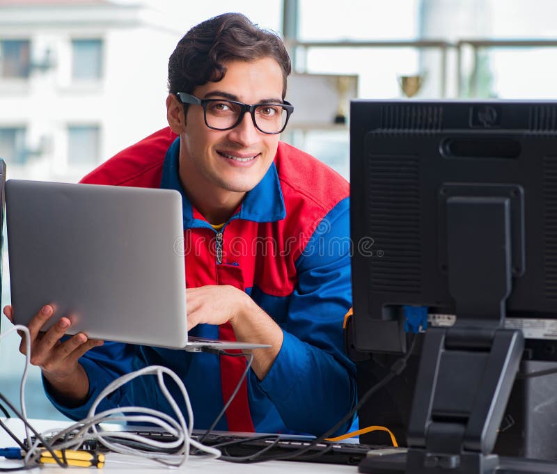 Computer Repairman Working on Repairing Computer in it Workshop Stock ...