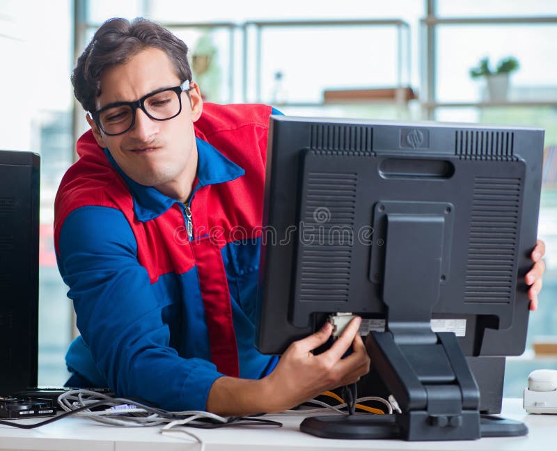 Computer Repairman Working on Repairing Computer in it Workshop Stock ...