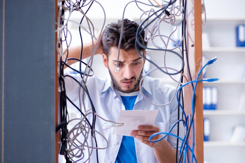 The Computer Repairman Working on Repairing Network in it Workshop ...
