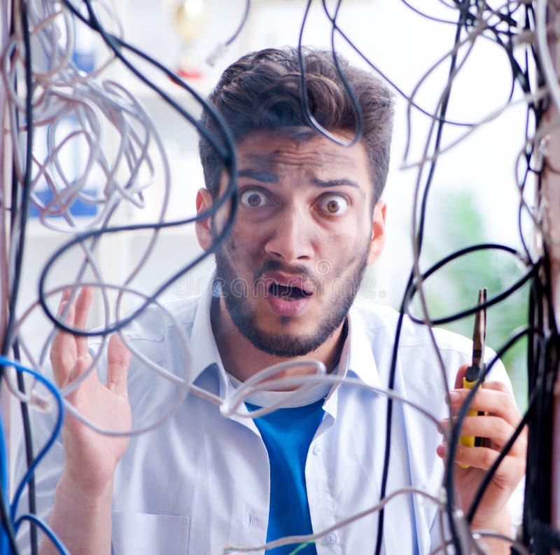 Computer Repairman Working on Repairing Network in it Workshop Stock ...