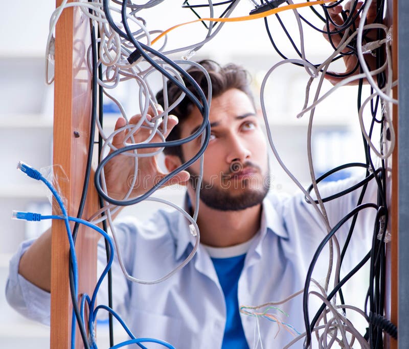 Computer Repairman Working on Repairing Network in it Workshop Stock ...