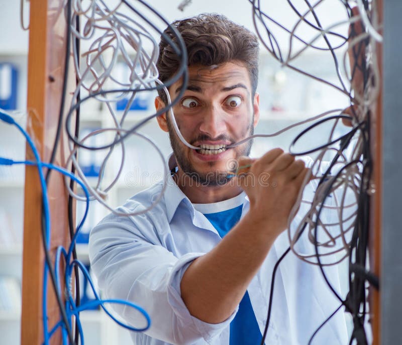 Computer Repairman Working on Repairing Network in it Workshop Stock ...