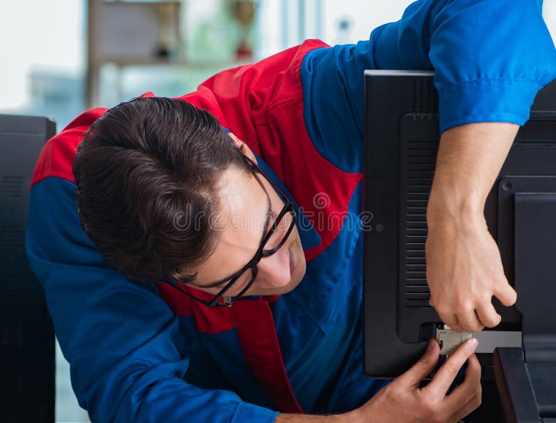 Computer Repairman Working on Repairing Computer in it Workshop Stock ...