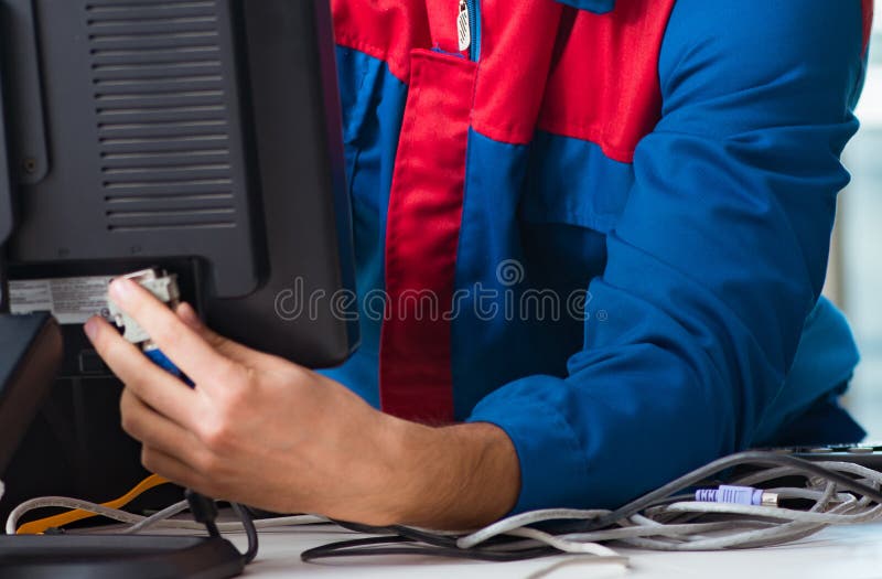 Computer Repairman Working on Repairing Computer in it Workshop Stock ...