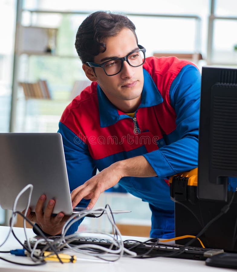 The Computer Repairman Working on Repairing Network in it Workshop ...