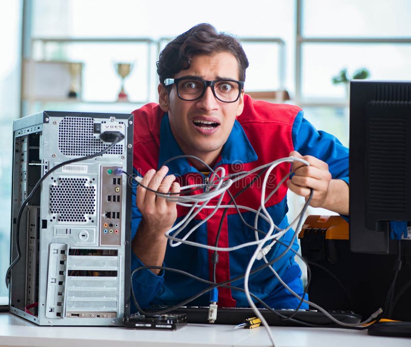 Computer Repairman Working on Repairing Computer in it Workshop Stock ...