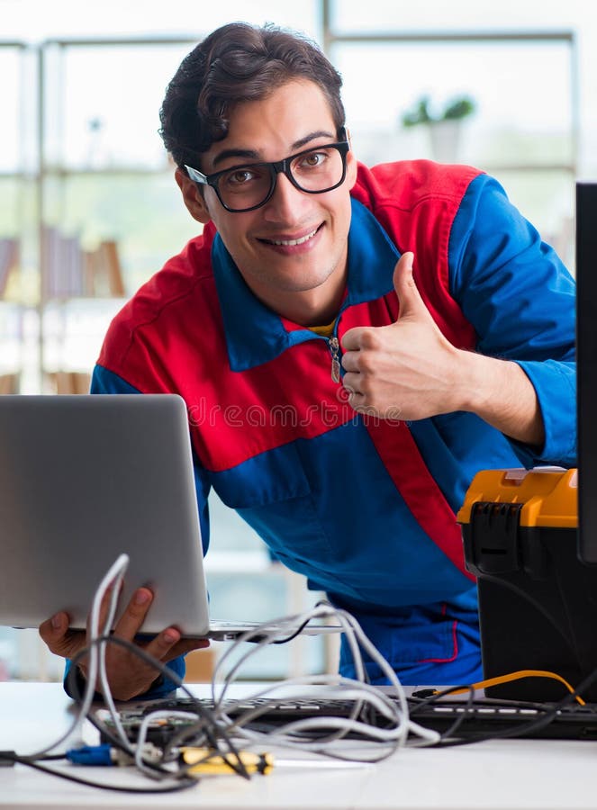 Computer Repairman Working on Repairing Computer in it Workshop Stock ...