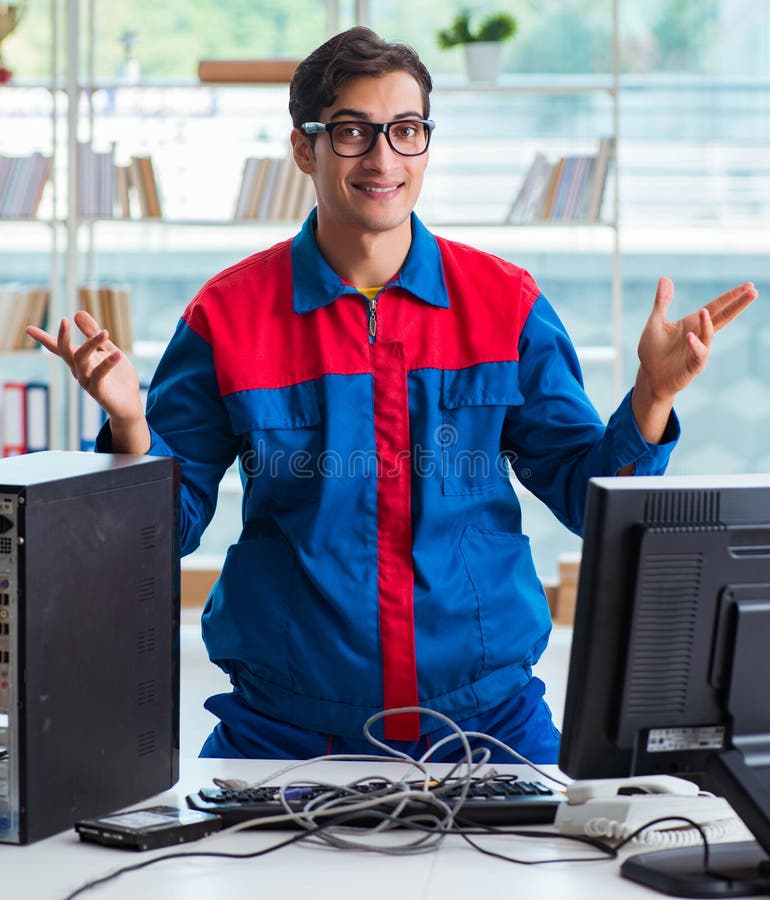 Computer Repairman Working on Repairing Computer in it Workshop Stock ...