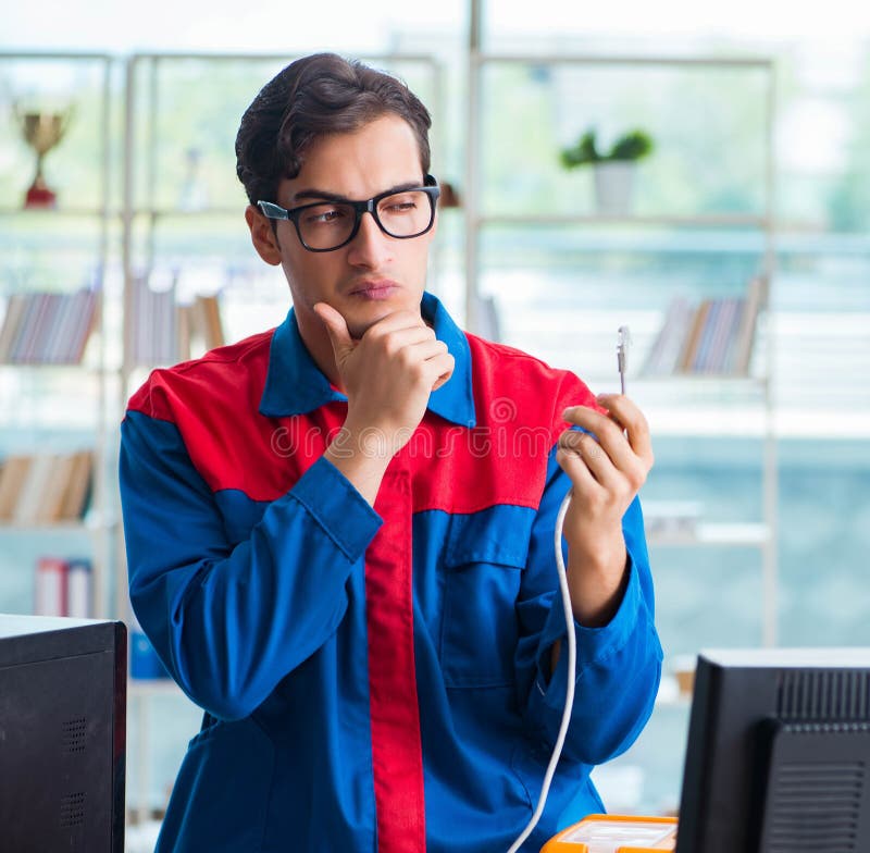 Computer Repairman Working on Repairing Computer in it Workshop Stock ...