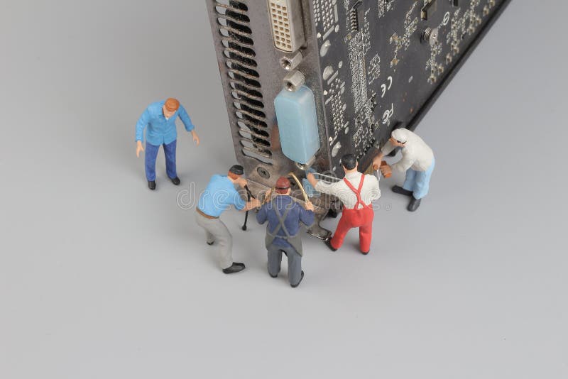 Computer Repairs Concept with Mini Figures and Components Stock Photo ...