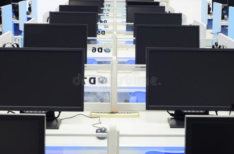 Blue Screens in Office Room Stock Photo - Image of monitors, laptop ...