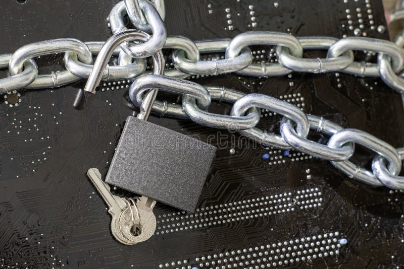 The Computer`s Motherboard is Wrapped in an Iron Chain the Lock with ...