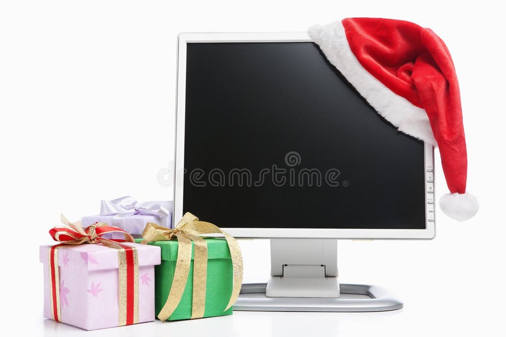 Computer, Santa Hat and Gifts Stock Image - Image of ribbon, isolated ...