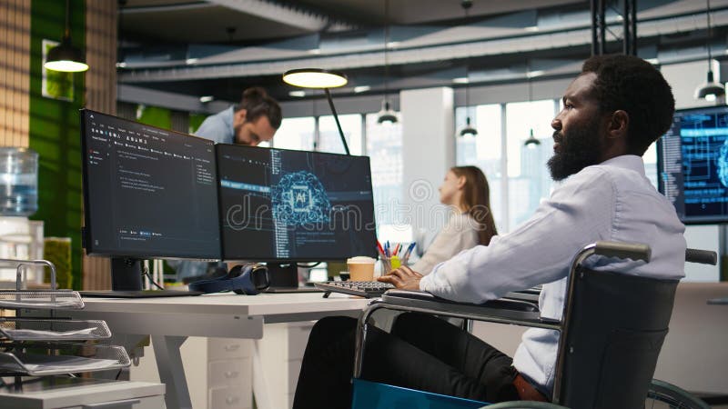 Computer Scientist with Paraplegia in Office Automating Repetitive ...