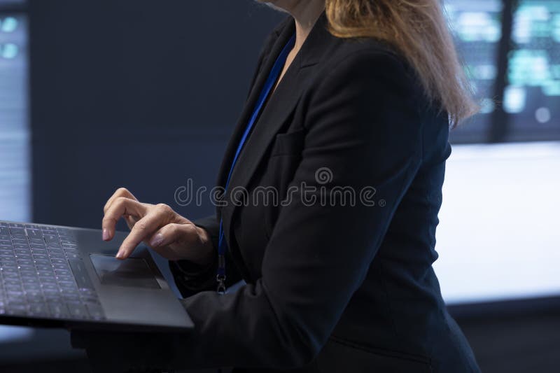 Close Up of Data Center Worker Doing Hardware Upgrades with Laptop ...