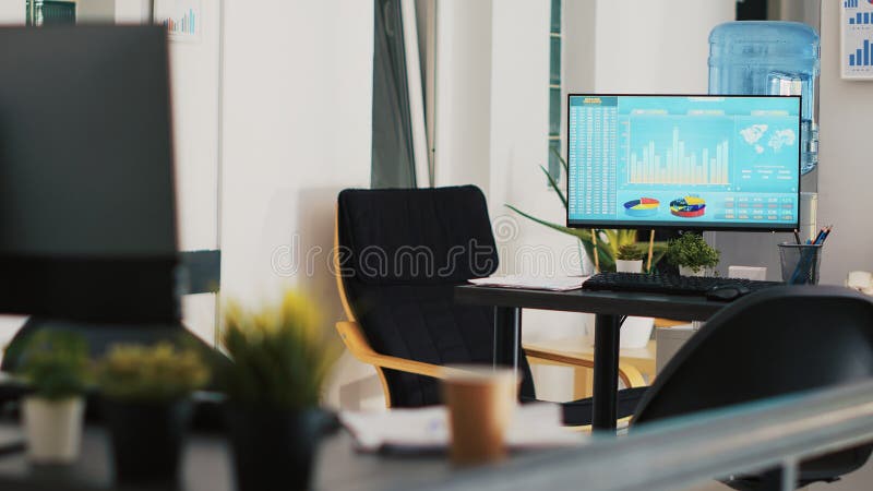 Computer Screen in Company Workspace Showing Trading Platform and Pie ...