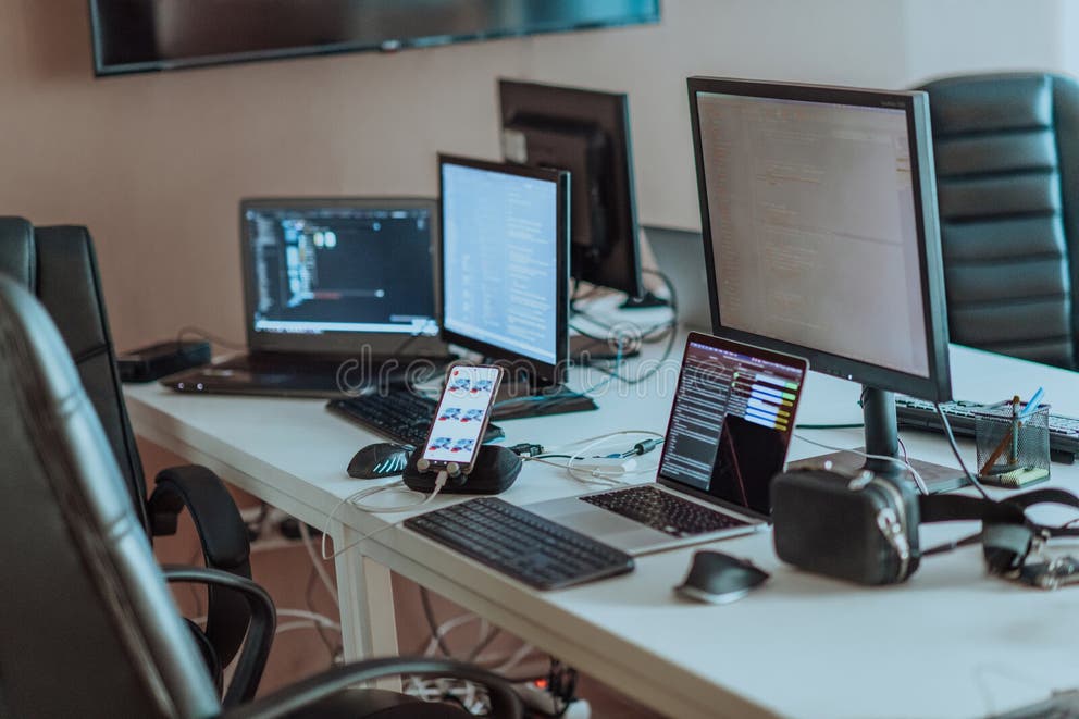 Computer Screens Running Programming Code in Empty Software Developing ...