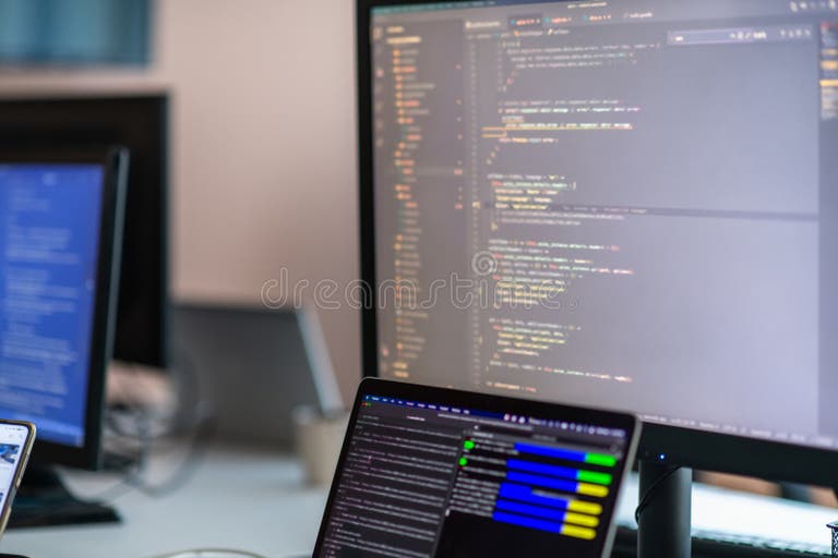 Computer Screens Running Programming Code in Empty Software Developing ...