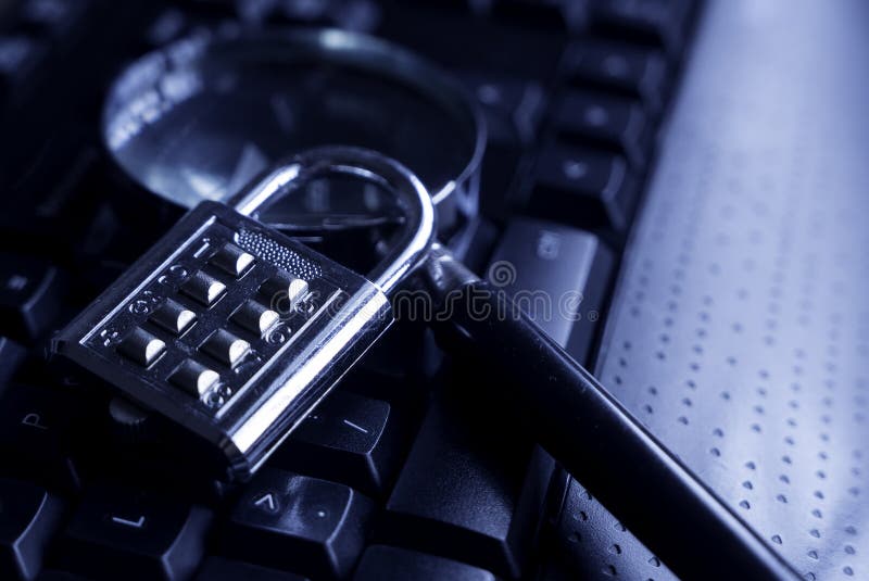 Computer Security Concept. a Padlock and Magnifying Glass on a Computer ...