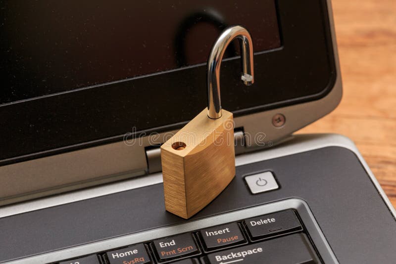 Unlocked Padlock And Laptop Stock Photo - Image of censorship, laptop ...