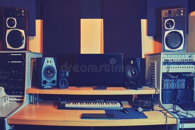 Computer, Speakers and Audio Equipment on the Table in the Recording ...