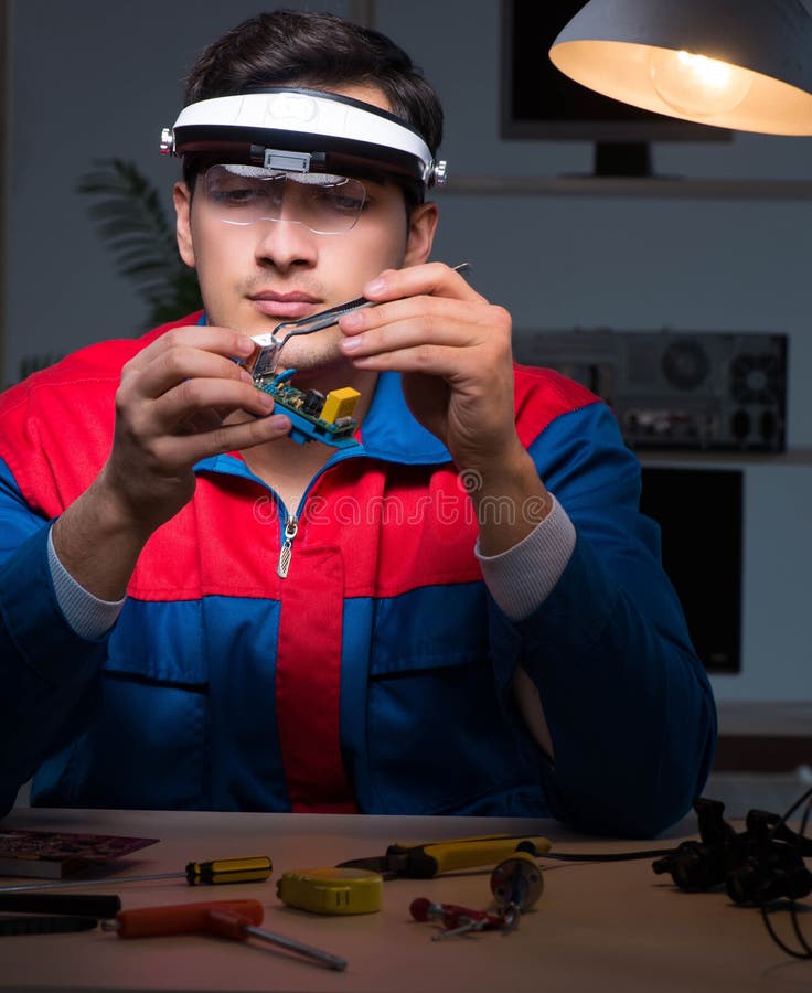 Computer Specialist Repairing PC Late at Night Stock Image - Image of ...