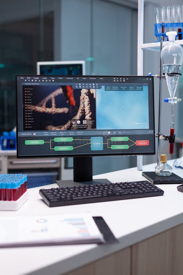 Computer with Microbiology Researcher Developing on Display Standing on ...