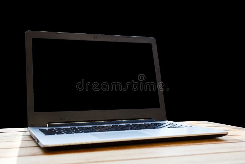 Computer Su Uno Scrittorio Su Un Fondo Nero Immagine Stock - Immagine ...