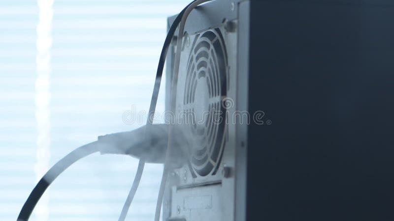 The Computer System Unit and the Power Supply are Smoking. Concept ...