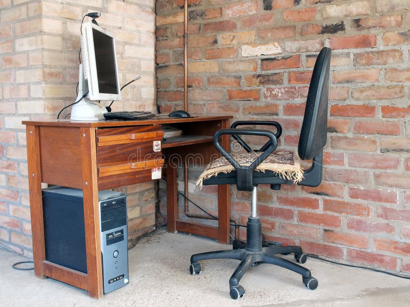 Computer table stock photo. Image of brick, room, working - 156309954