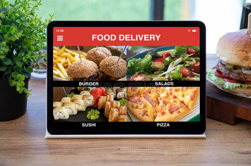 Computer Tablet with App Food Delivery on Screen in Cafe Stock Photo ...