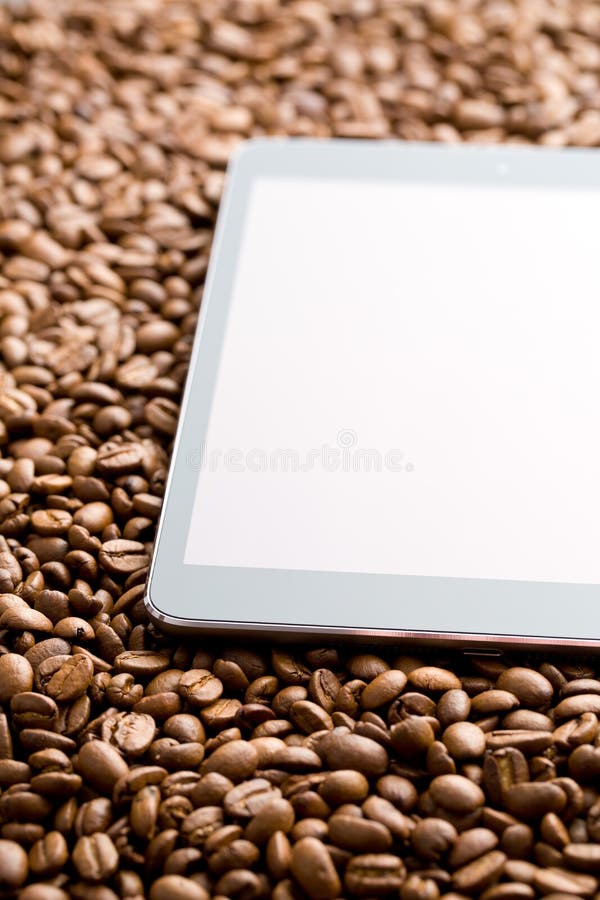 Computer Tablet on Coffee Beans Stock Image - Image of computer ...