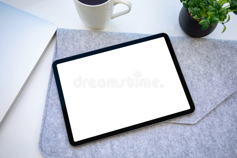 Computer Tablet with Isolated Screen on the Table in Office Stock Photo ...