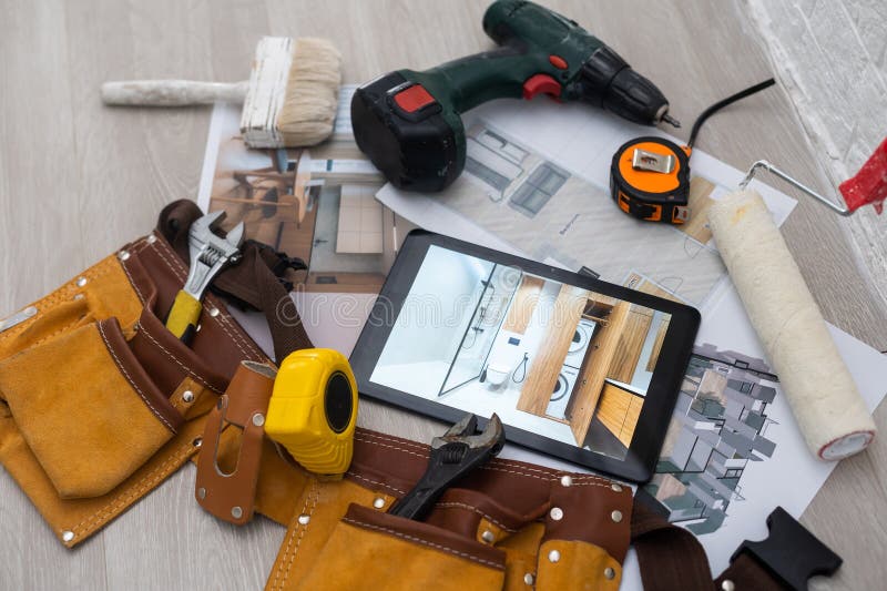 Computer Tablet Showing Apartment Illustration Sitting on House Plans ...