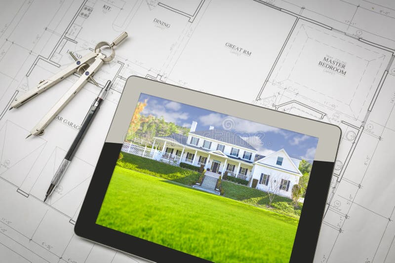Computer Tablet Showing House Image on House Plans, Pencil, Comp Stock ...