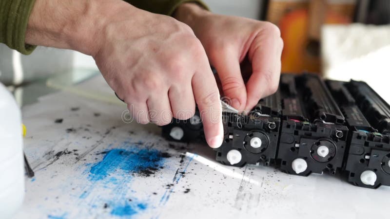 Computer Technician Engineer is Refilling a Laser Toner Cartridge ...