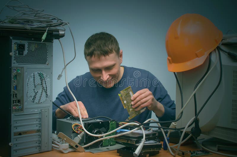 Computer technician. stock photo. Image of hands, card - 129464456