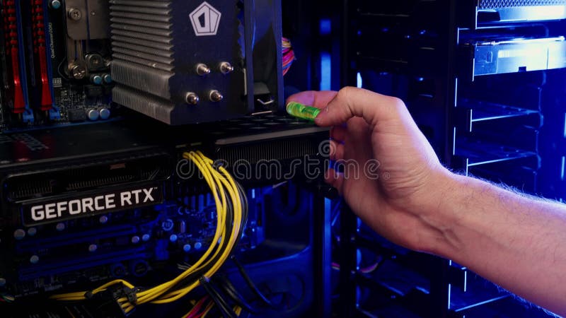 Computer Technician Installing Hard Disk Close Up in PC Case. . Minsk ...