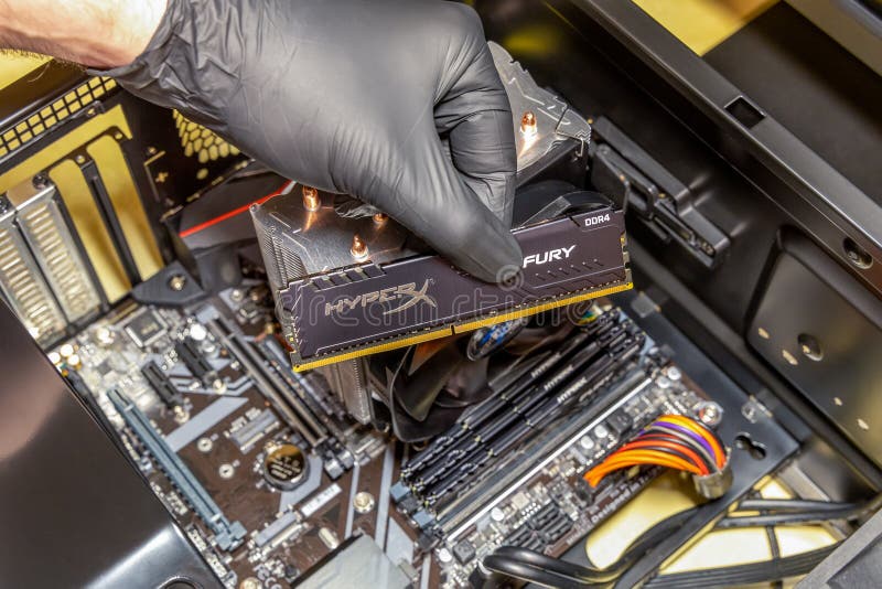 Computer Technician Installing New HyperX RAM DDR4 Memory for PC. PC ...