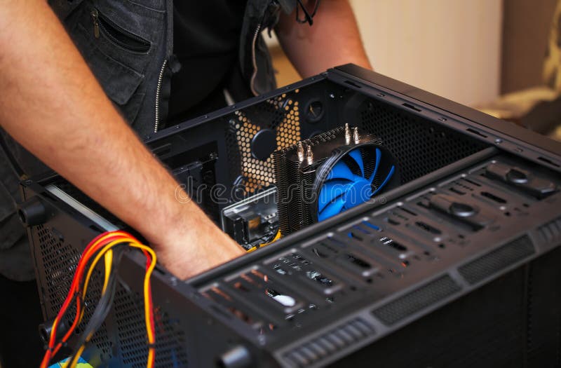 Computer Technician Installs System of Computer. Stock Image - Image of ...