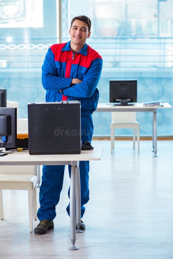 The Computer Technician Repairing Broken Computer in Workshop Stock ...