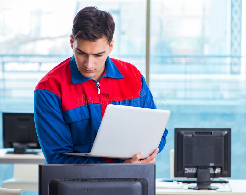 Computer Technician Repairing Broken Computer in Workshop Stock Photo ...